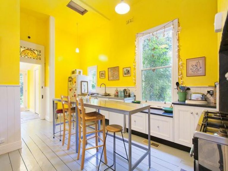 Bright Cheery Yellow Painted Kitchen and Dining Room - Interiors By Color